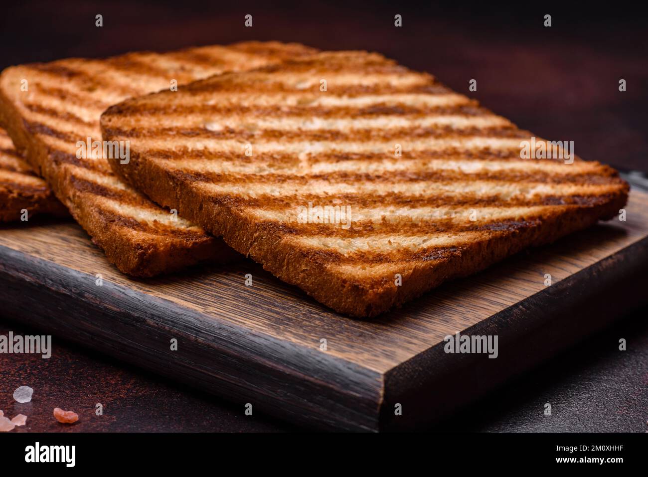 Tasty fresh crispy bread slices in the form of grilled toast for ...