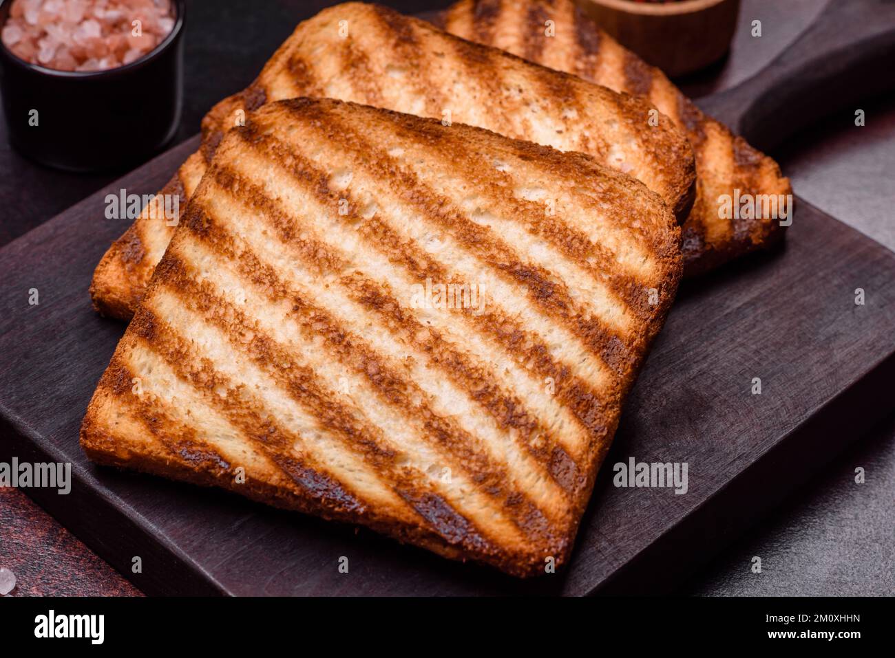 Tasty fresh crispy bread slices in the form of grilled toast for ...