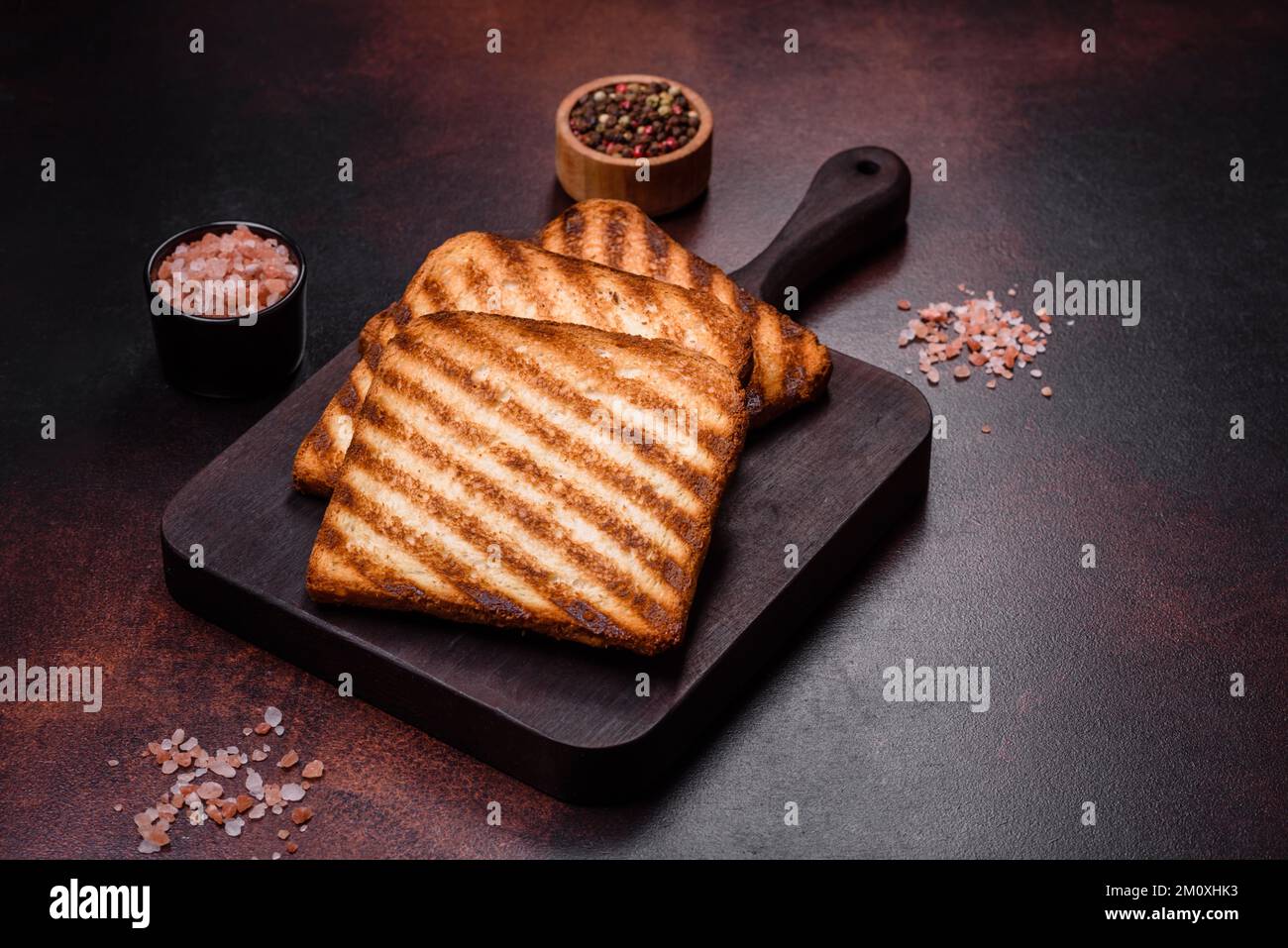 Tasty fresh crispy bread slices in the form of grilled toast for ...