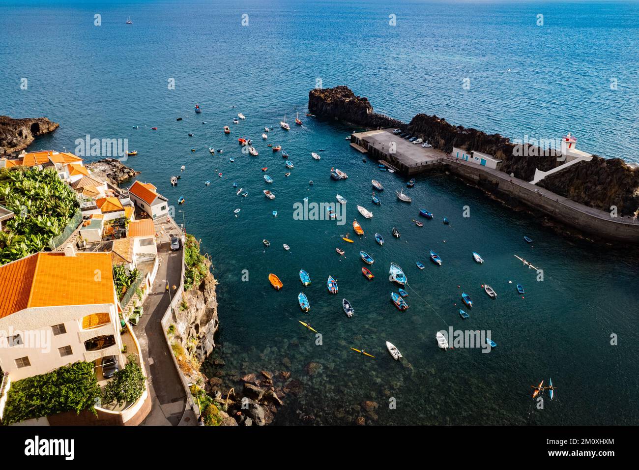 Colorful fishing harbor Camara de Lobos in Madeira island with boats ...