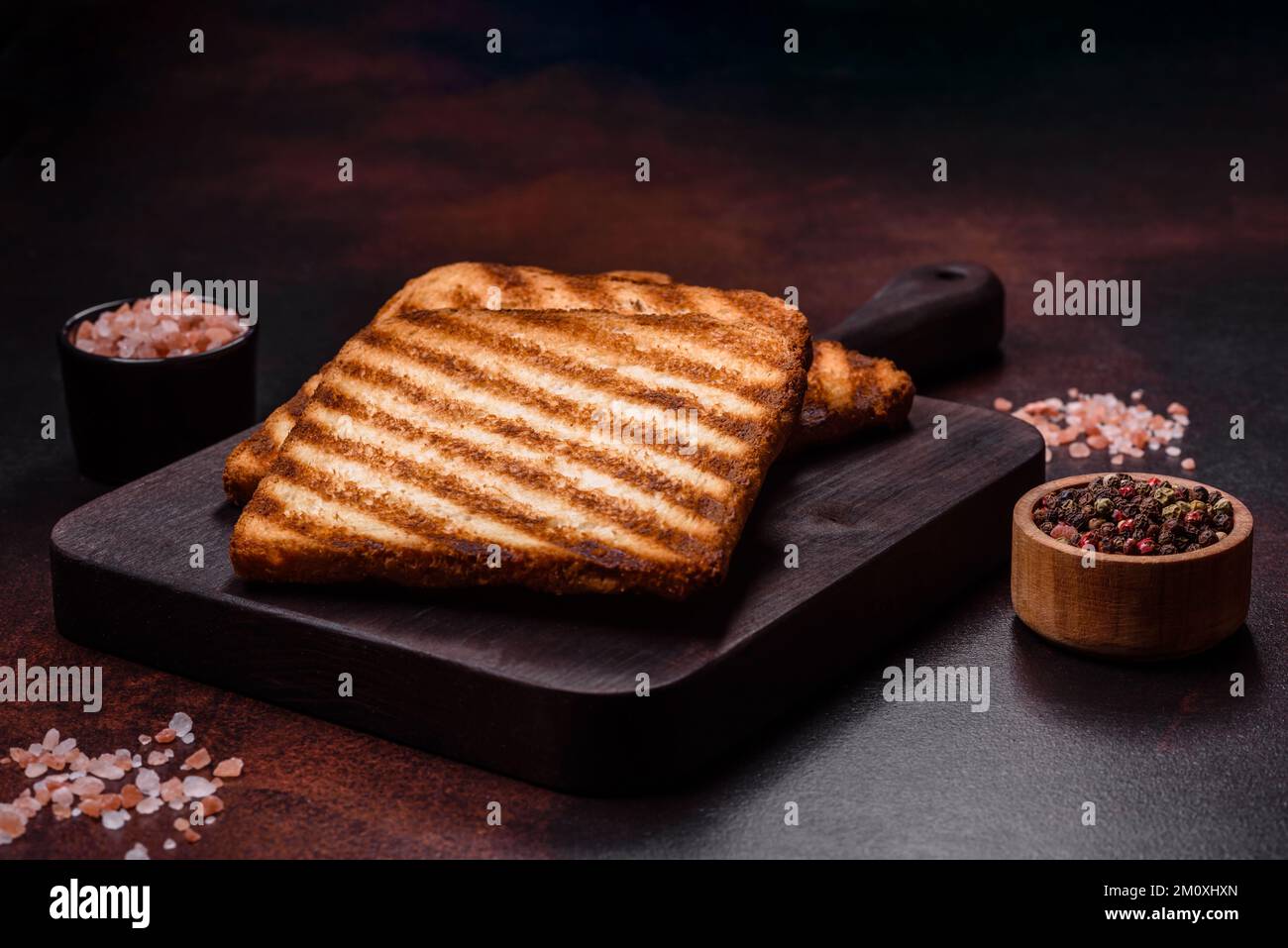 Tasty fresh crispy bread slices in the form of grilled toast for ...