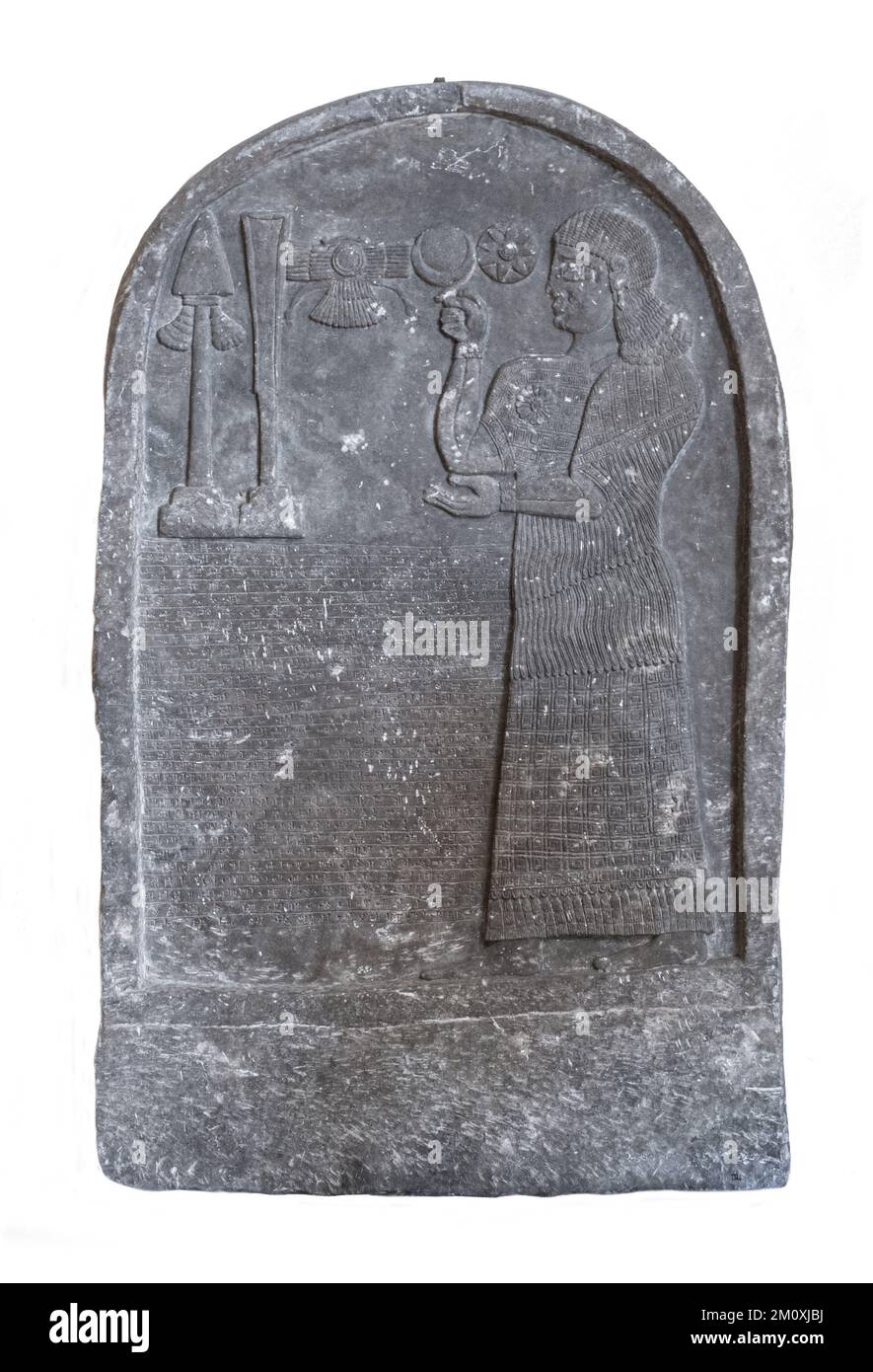 Bel Haran Beli Usur is praying in front of divine symbols. Stele with ...
