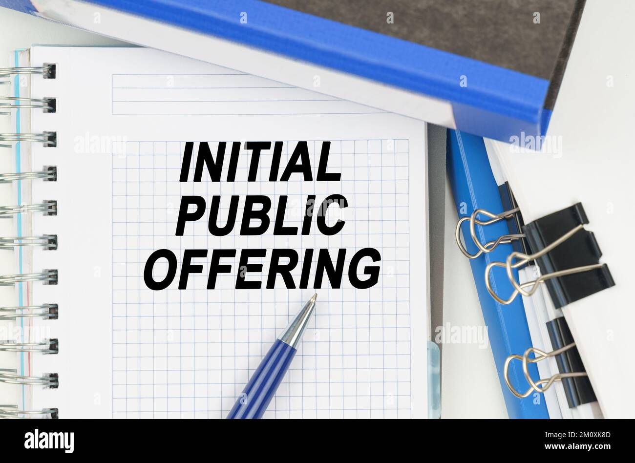 Business and Economics. Among the documents, folders, a notebook with ...