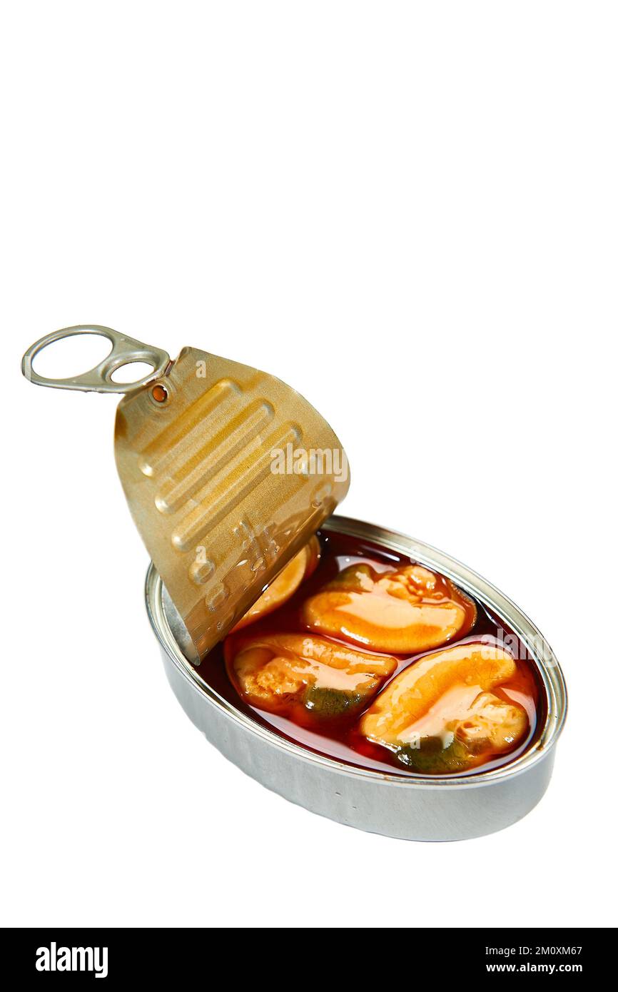 Close up of a can of pickled big mussel on white background Stock Photo ...