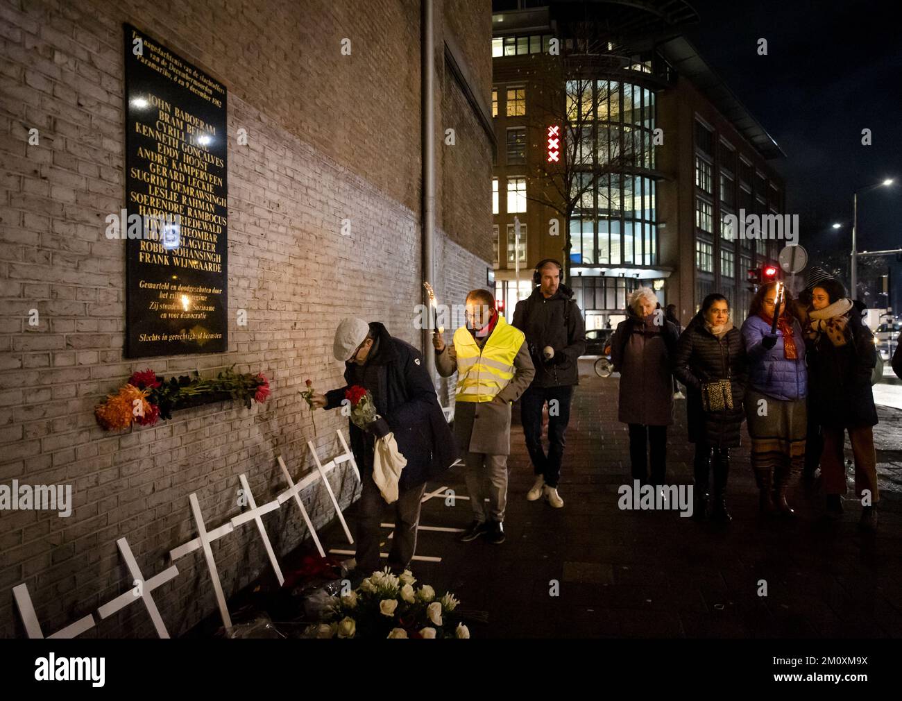 AMSTERDAM - 08/12/2022, Interested parties during the commemoration of ...