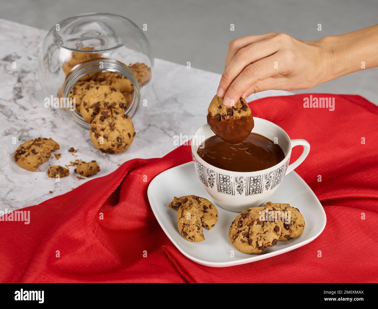 Hand picking up cup hi-res stock photography and images - Alamy