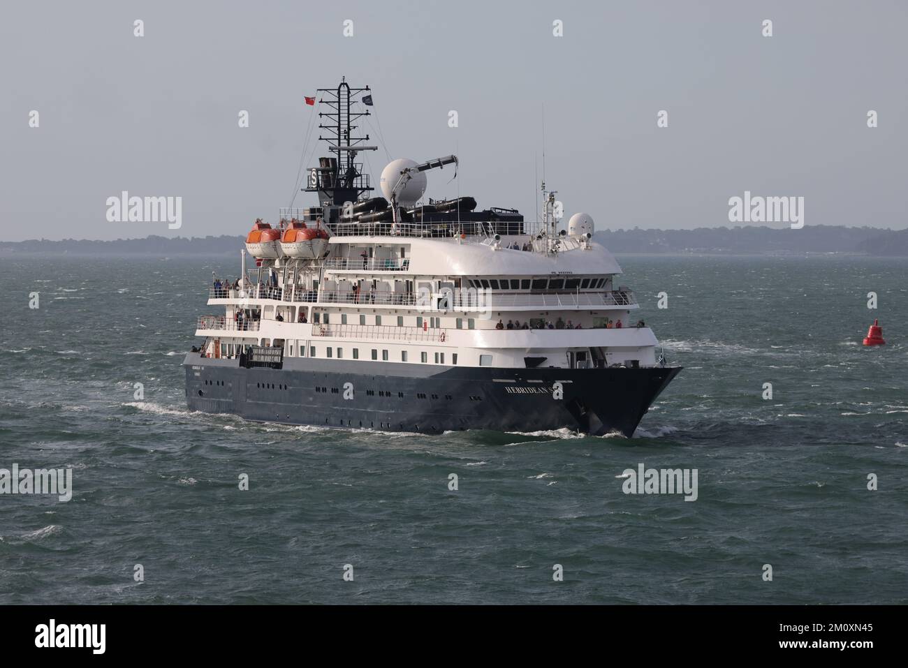 The Noble Caledonia cruise ship HEBRIDEAN SKY approaching the harbour ...