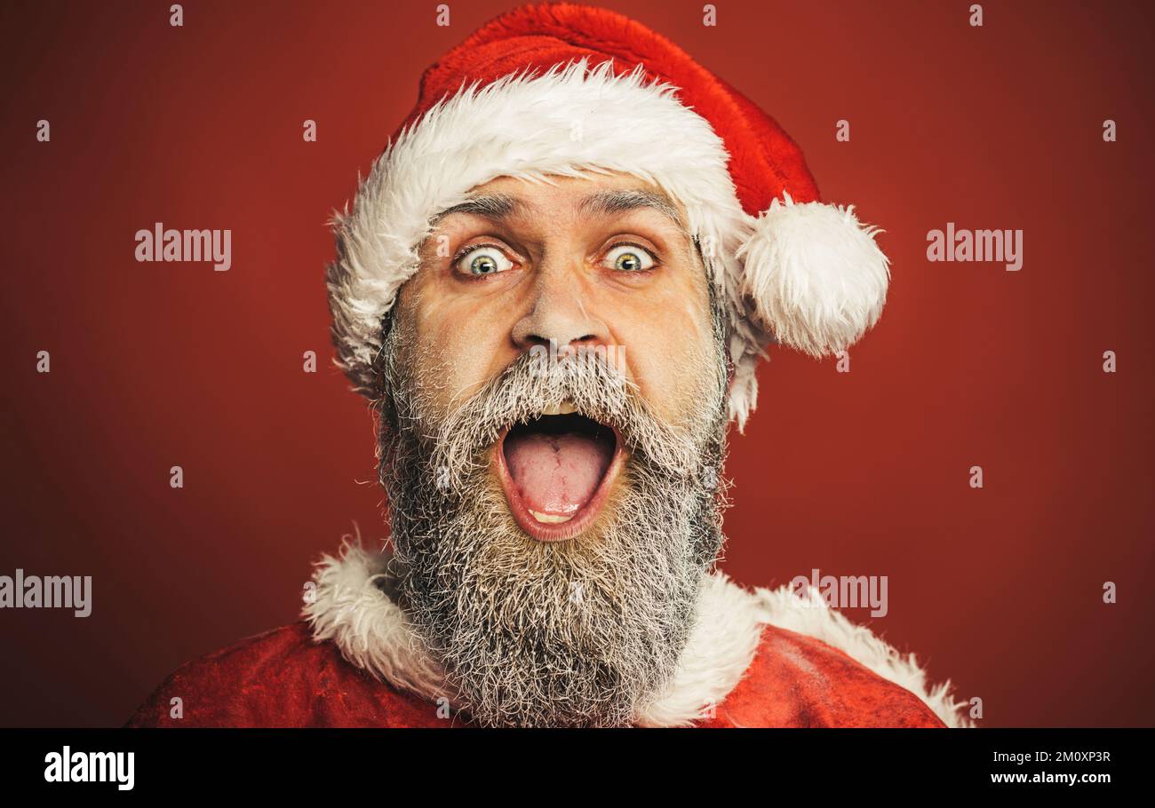 Merry Christmas and Happy New Year. Cheerful Santa Claus man in ...