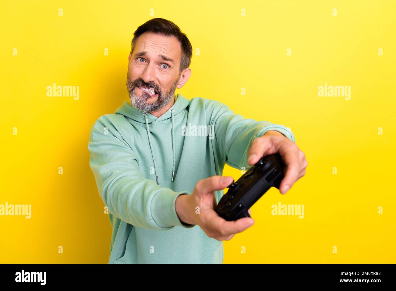 Portrait of stressed depressed man have free time home bite lips tense ...