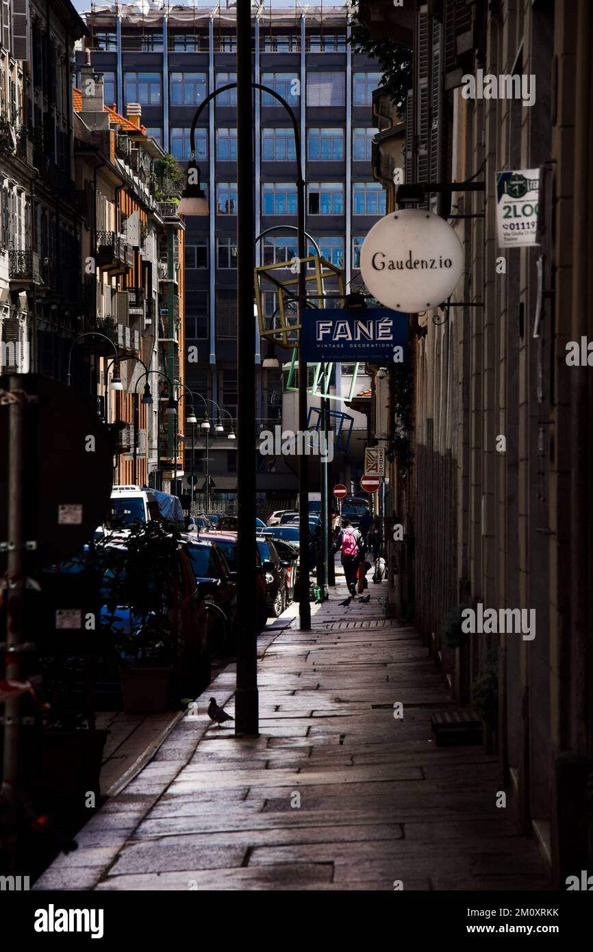 A vertical shot of the business center in Italy, Turin with brand logos ...