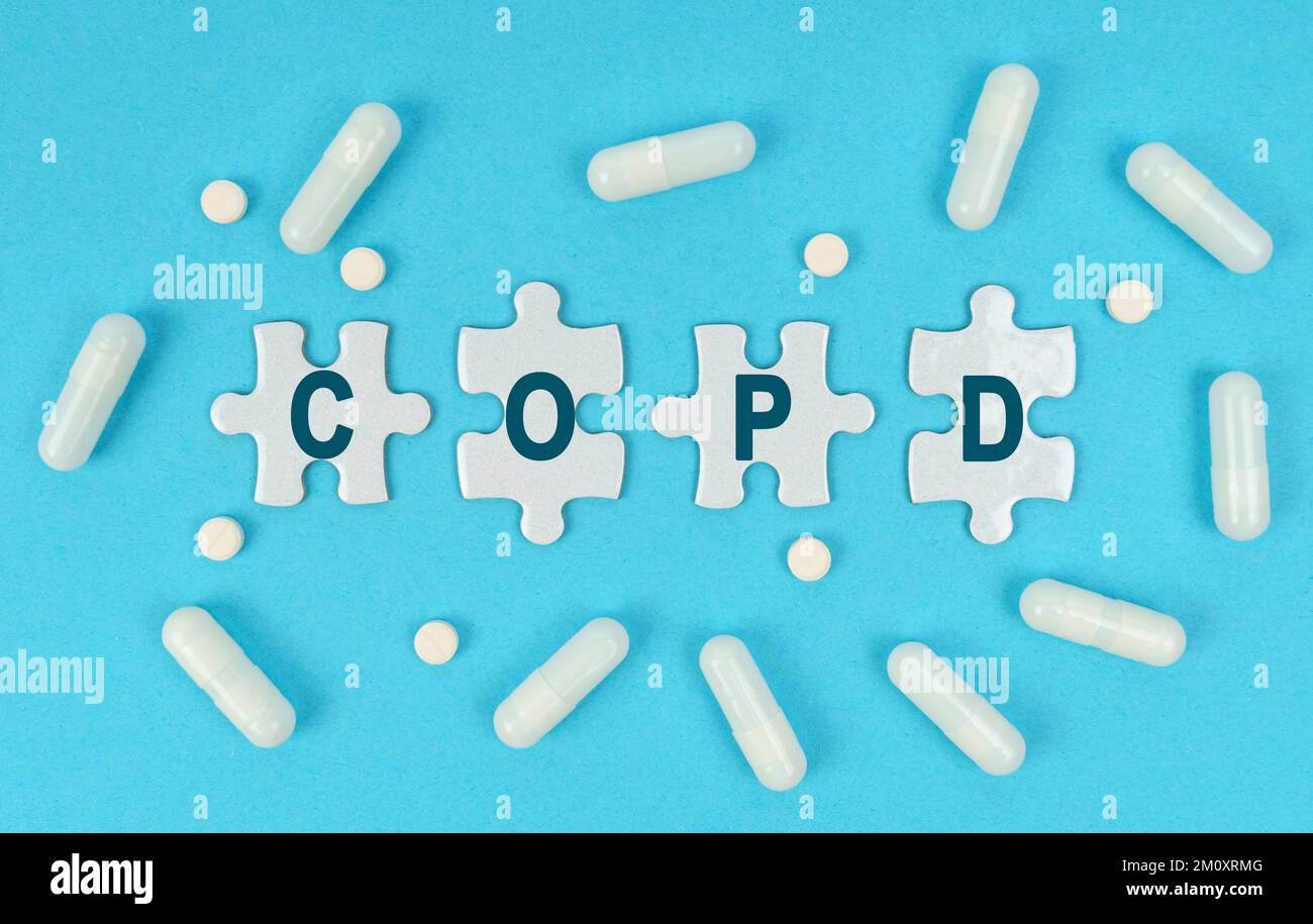 Medicine and health. On a blue background, there are pills and puzzles ...