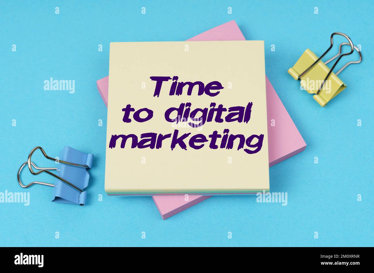 Business and finance concept. On the table are paper clips, note paper ...