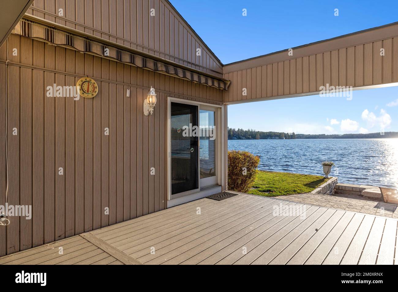 A beautiful view of the lake from the lakefront home on a sunny day ...