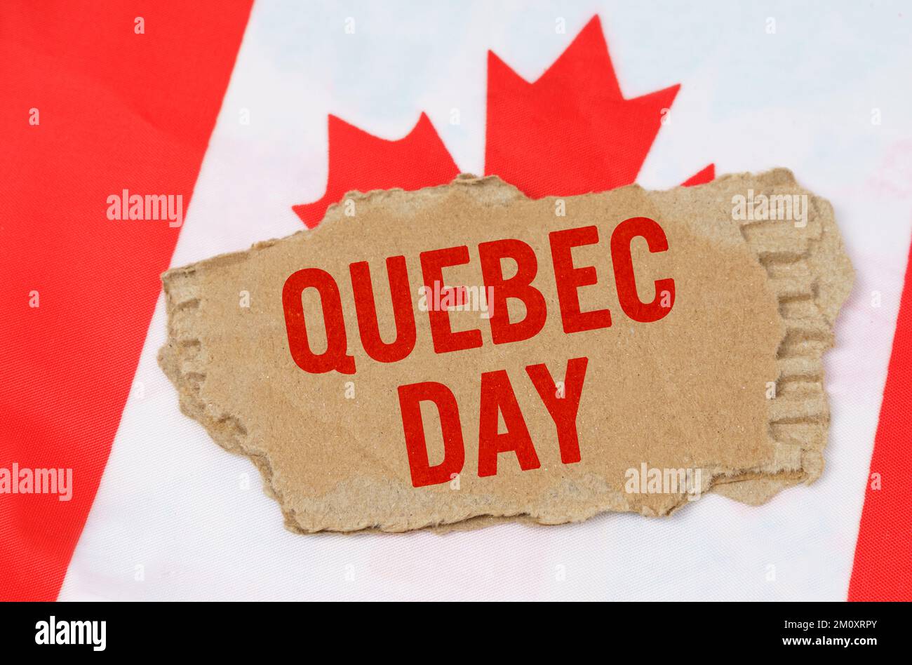 Holidays in Canada. Against the background of the flag of Canada lies ...