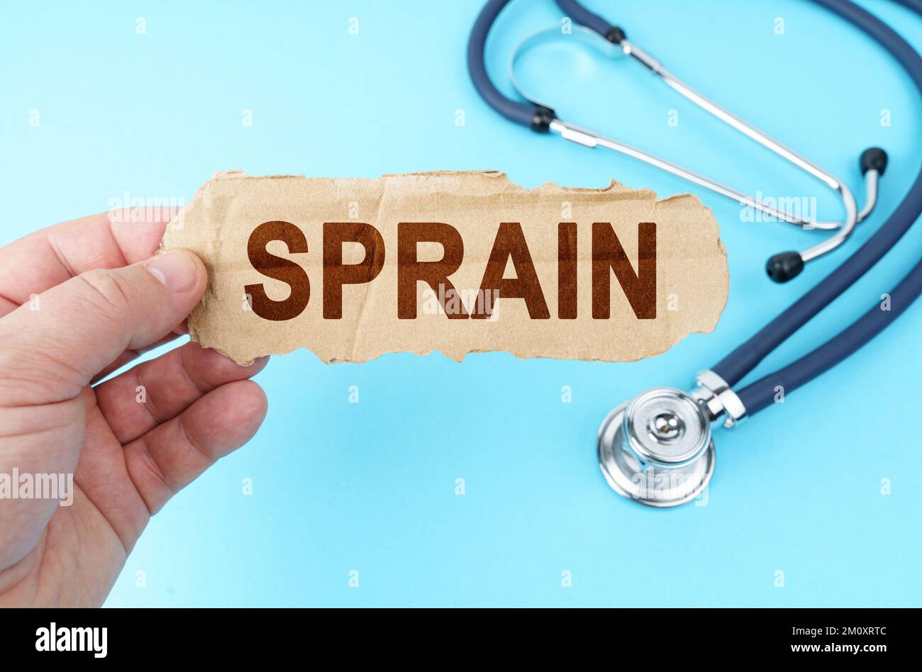 Medicine and health concept. On a blue background, a man holds a ...
