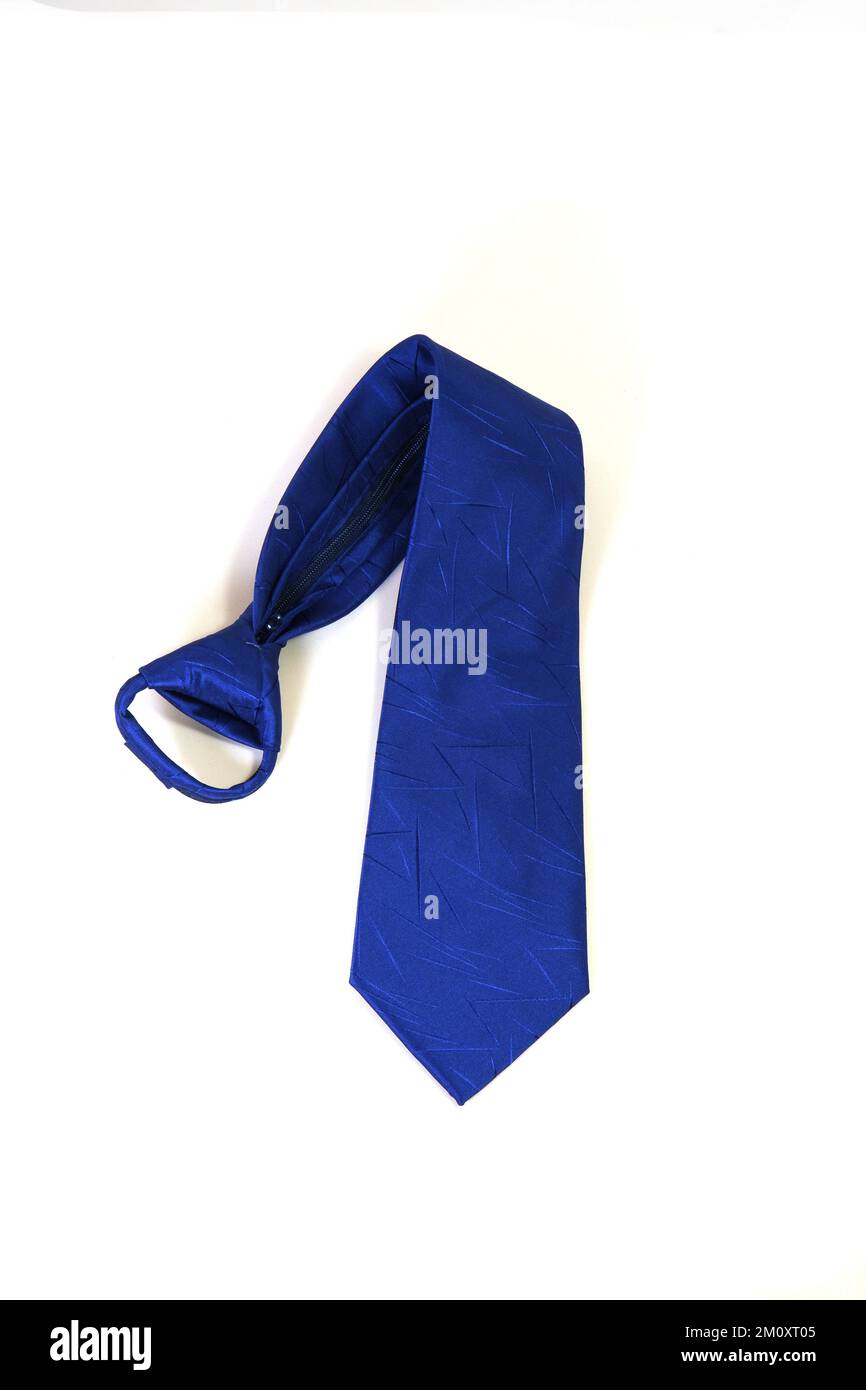 A vertical shot of a blue polyester necktie isolated on a white ...