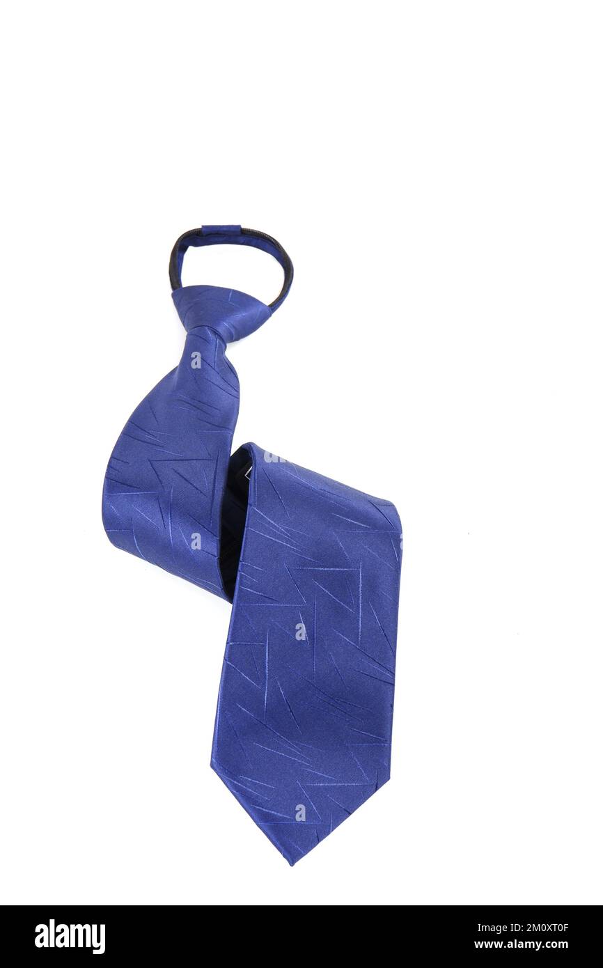 A vertical shot of a blue polyester necktie isolated on a white ...