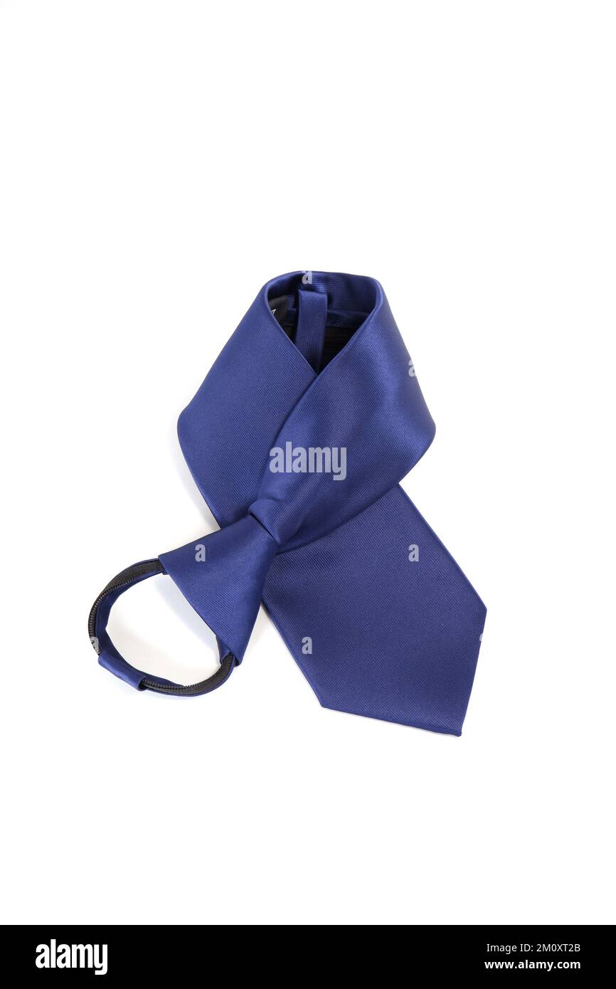 A vertical shot of a blue polyester necktie isolated on a white ...