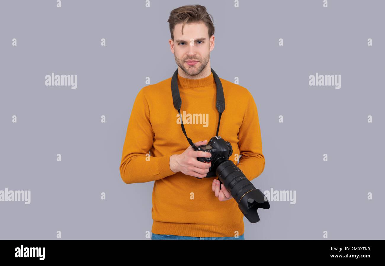 man photographing hold photo camera. photo of man photographing with ...