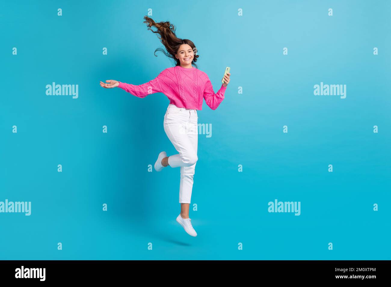 Full length photo of sweet pretty girl dressed knit pullover jumping ...