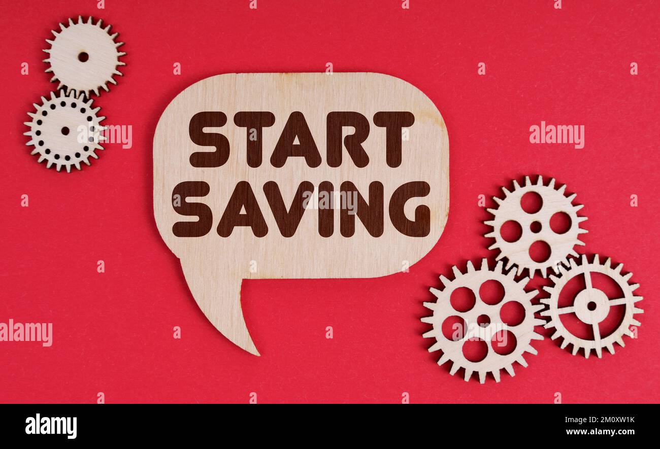 Business and finance concept. On a red background, gears and a thought ...