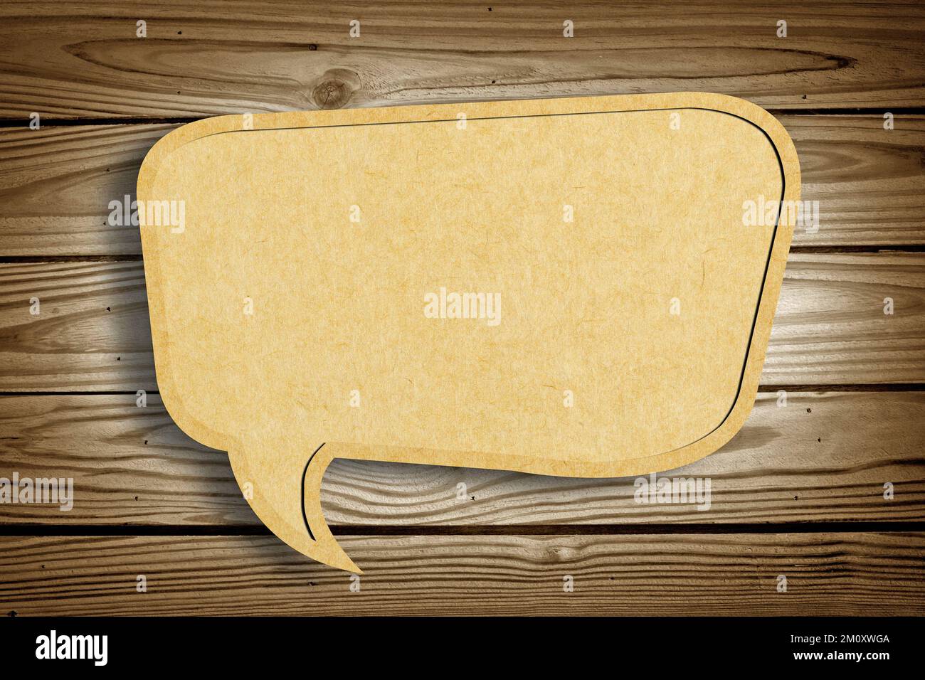 Blank carboard speech bubble on a rustic wooden background Stock Photo ...