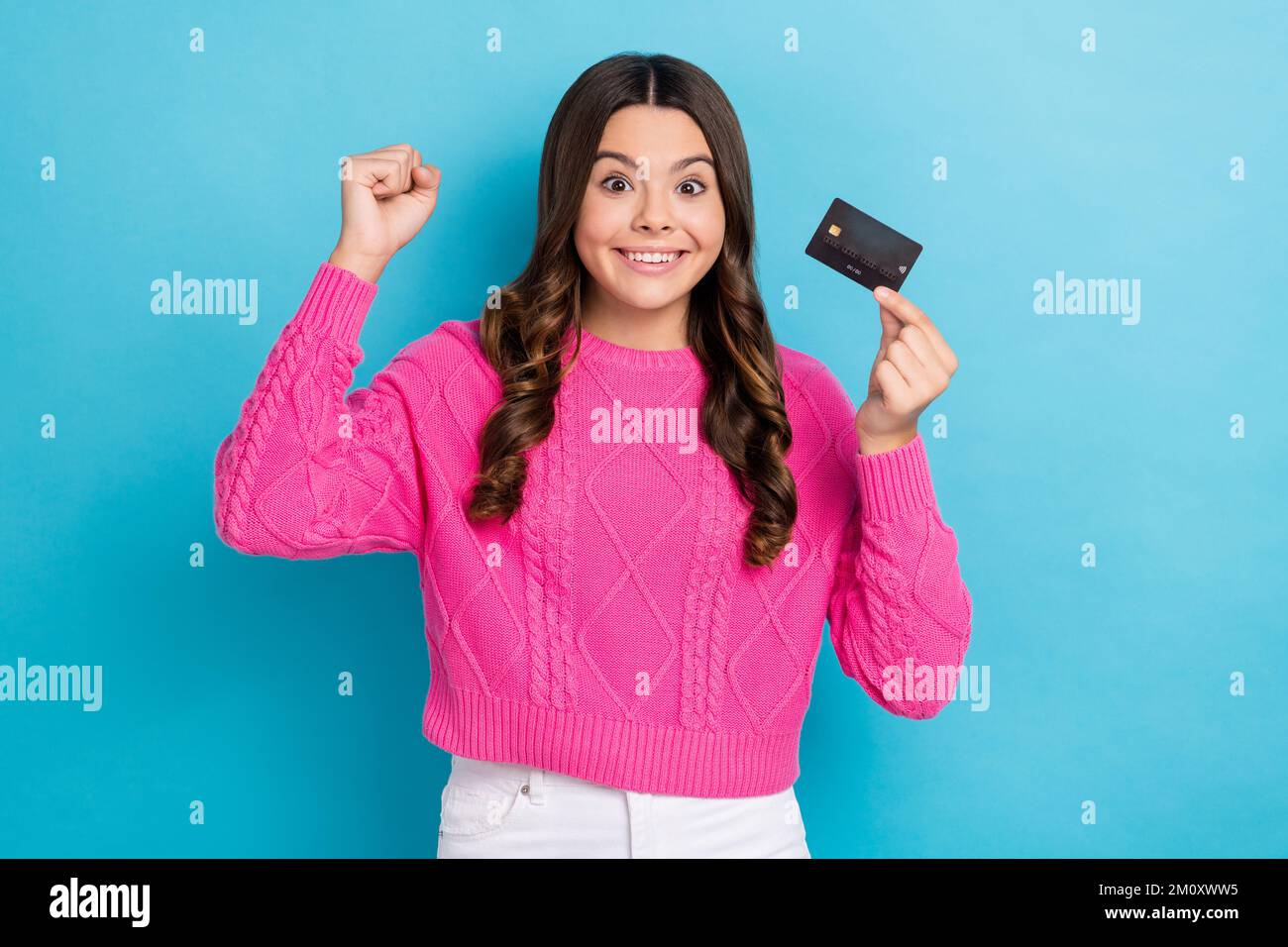 Photo of sweet lucky girl dressed knit pullover holding credit card ...