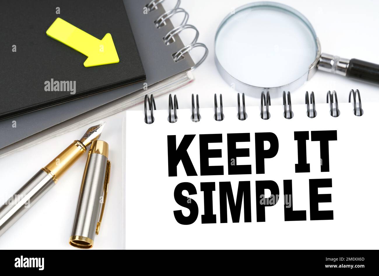 Business and finance concept. On the table are a pen and a notebook ...