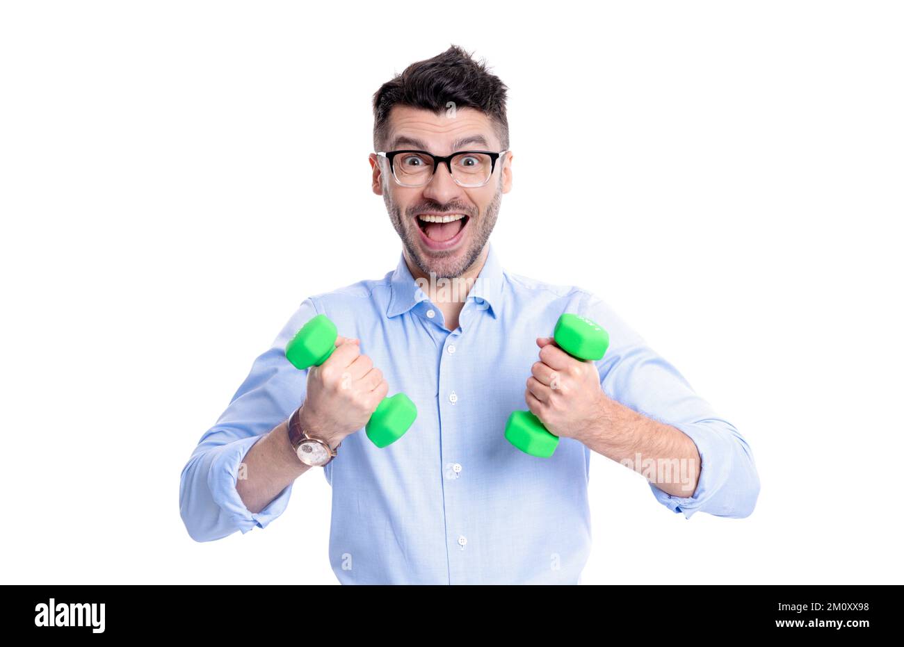 surprised business man with fitness dumbbells in studio. business man ...