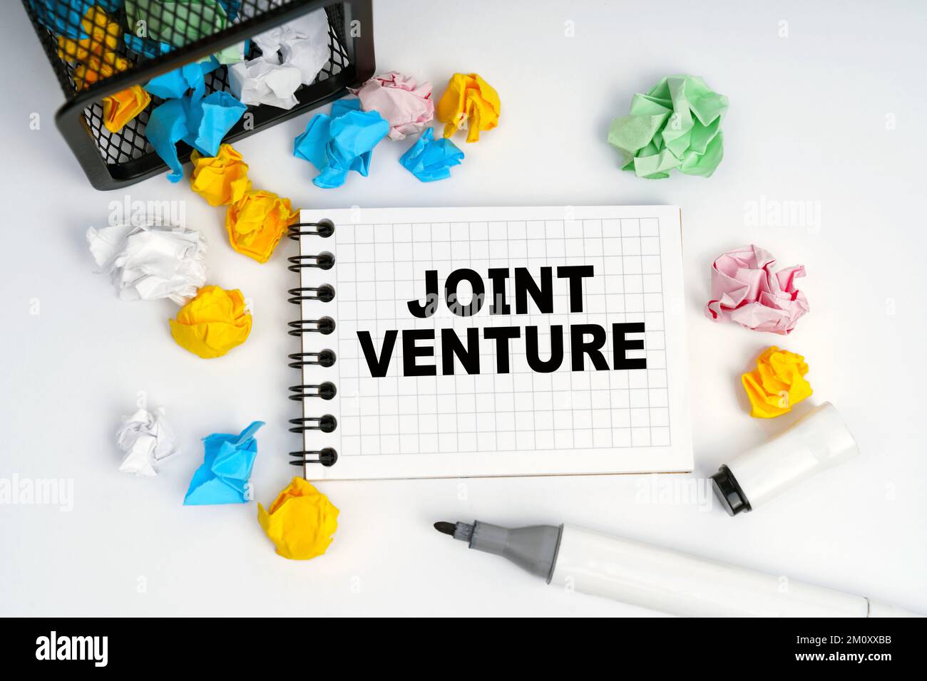 Business and finance concept. On the table is a basket, multi-colored ...