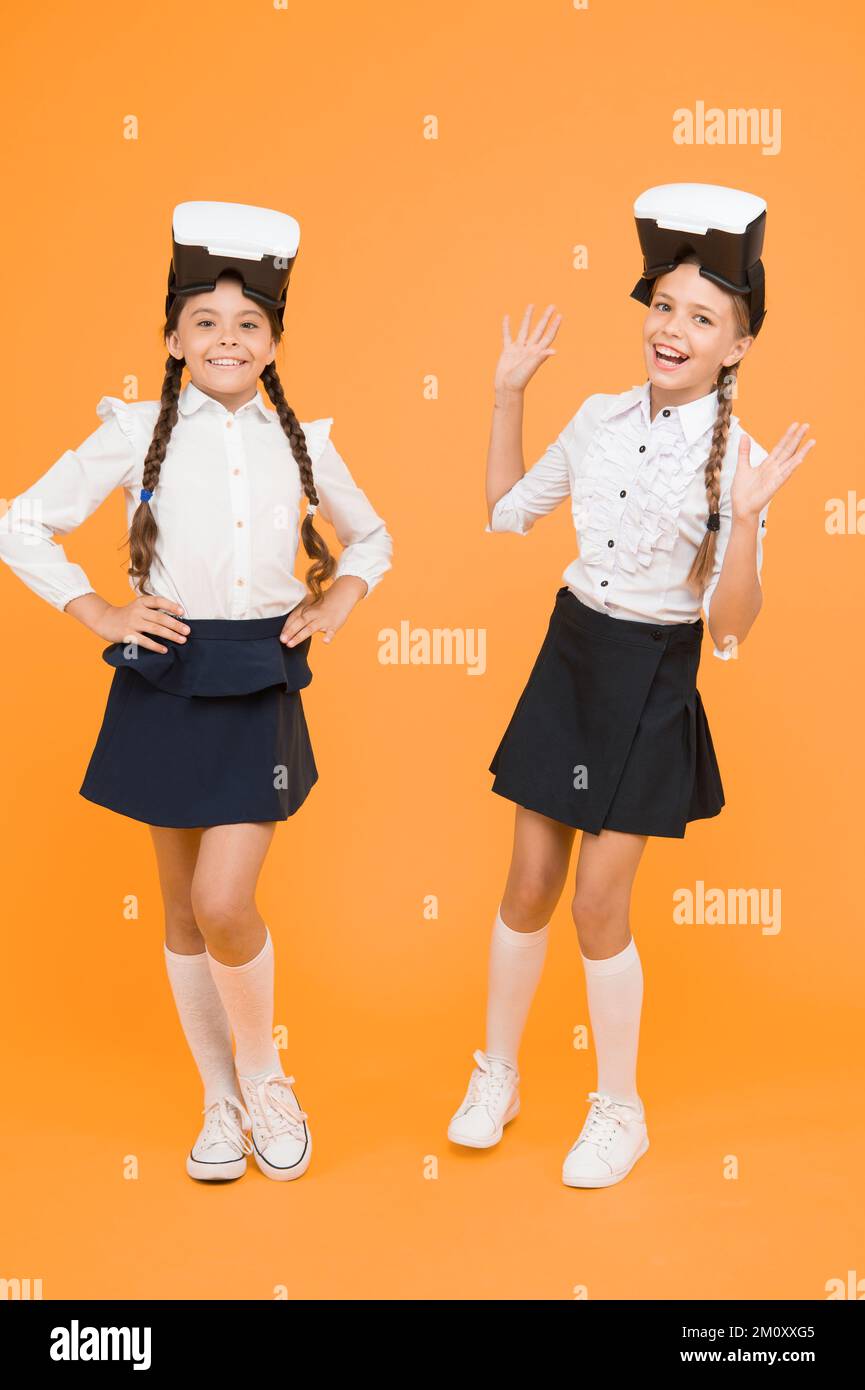 Different reality. virtual reality. small girls in VR headset. children ...
