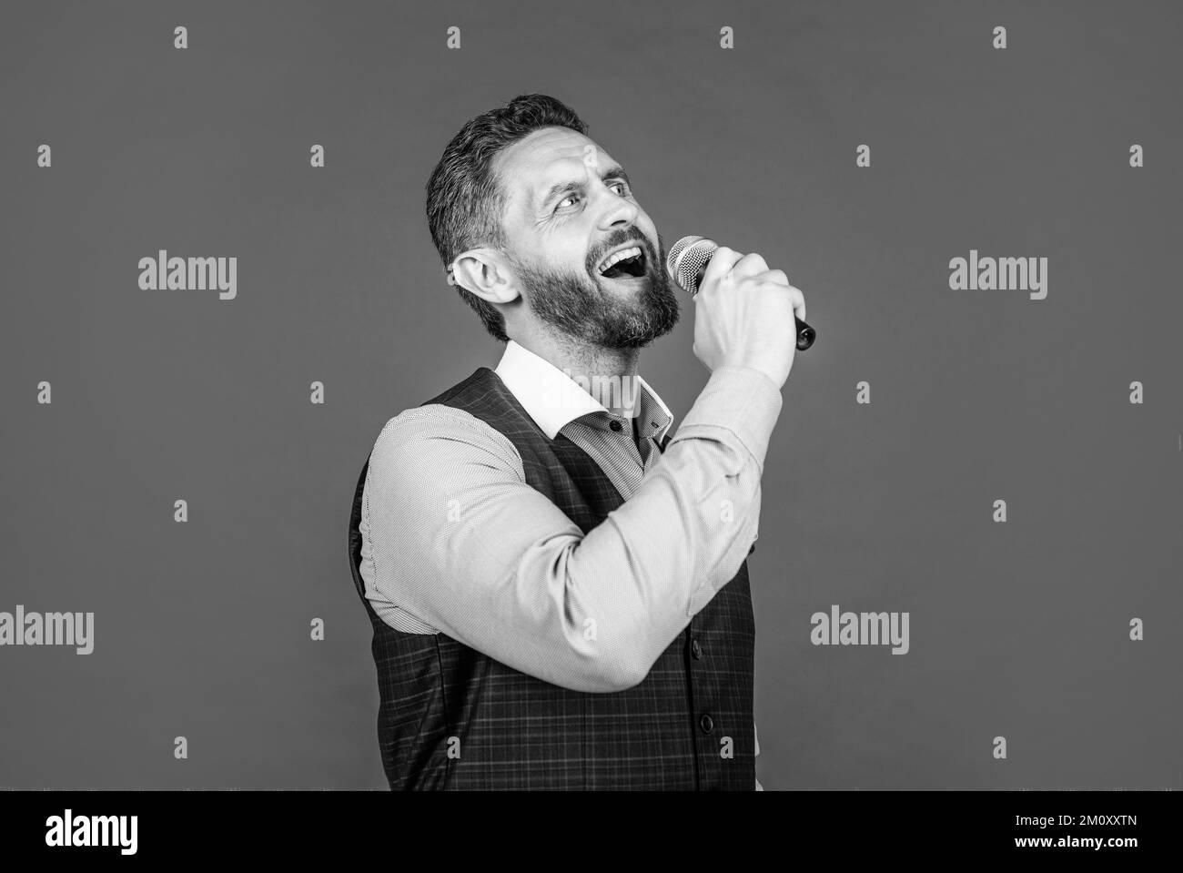 Keep calm and karaoke. Karaoke singer red background. Singing song to ...