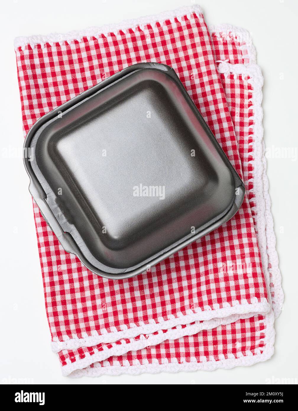 Disposable food container. Gray box of polystyrene on a white ...