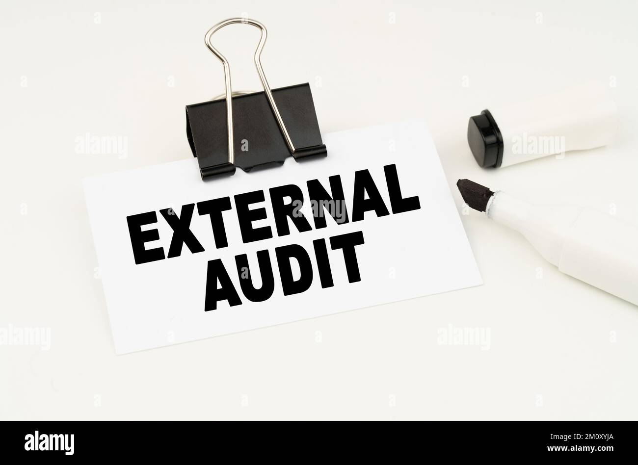 Finance and business concept. On a white background is a marker and a ...