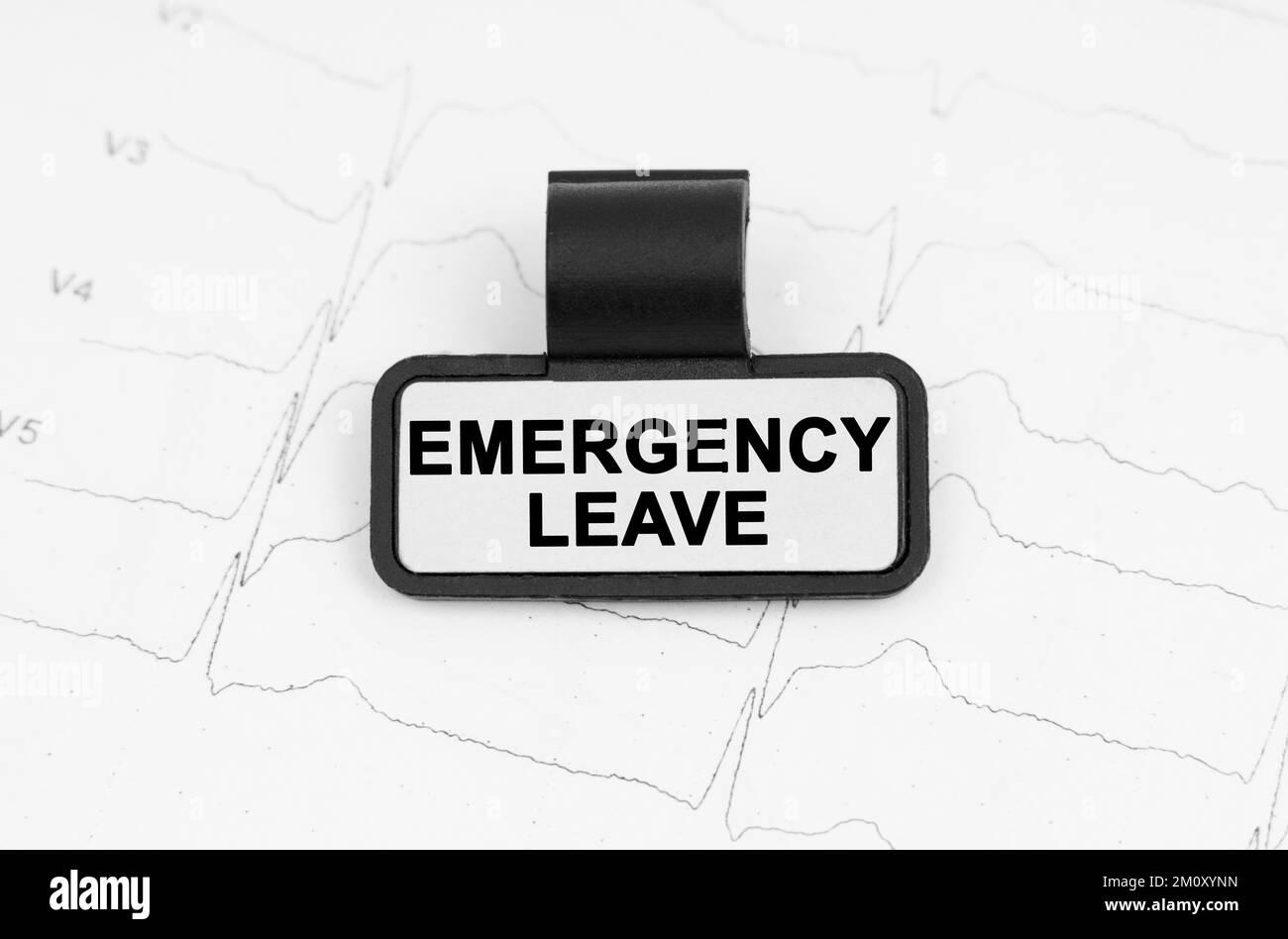 Medicine and health concept. There is a plate on the cardiogram with ...