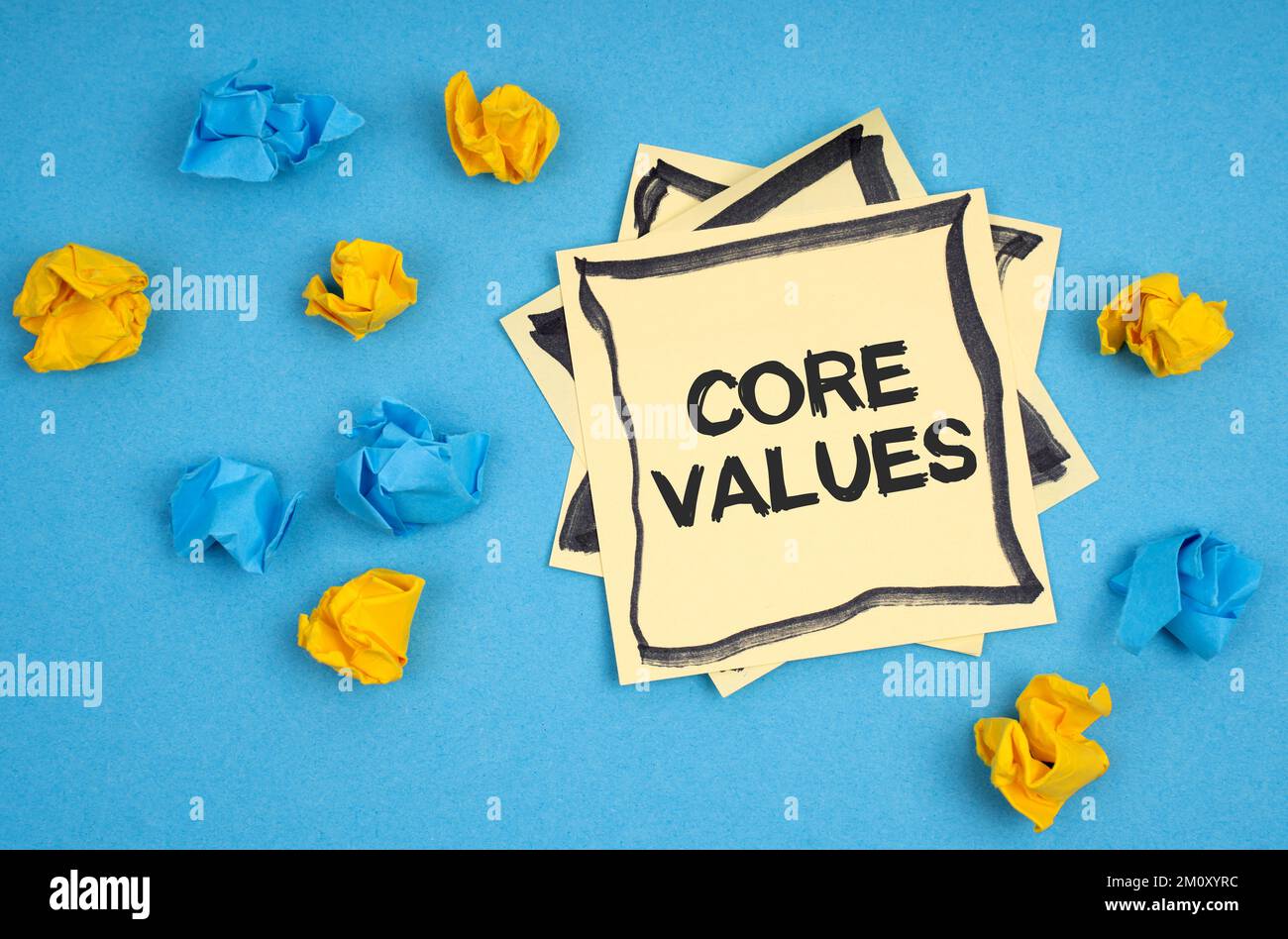 Business concept. On a blue background, there are pieces of paper and a ...