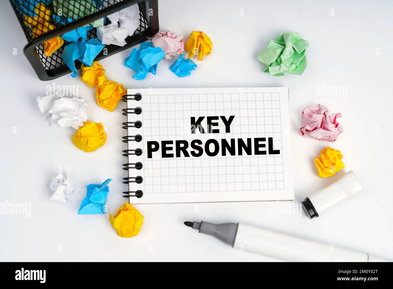 Business and finance concept. On the table is a basket, multi-colored ...