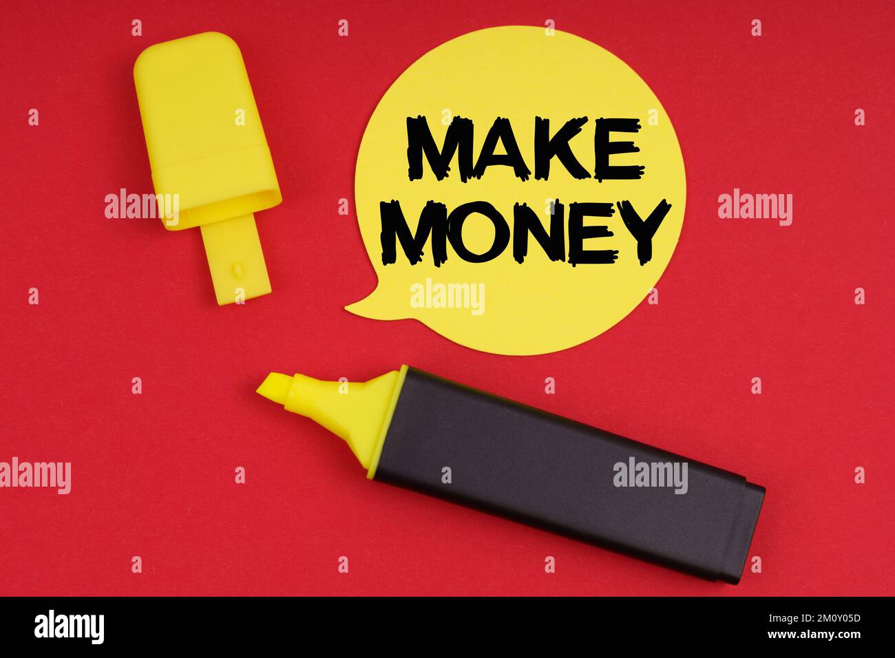 Business concept. On a red background is a marker and a sticker with ...
