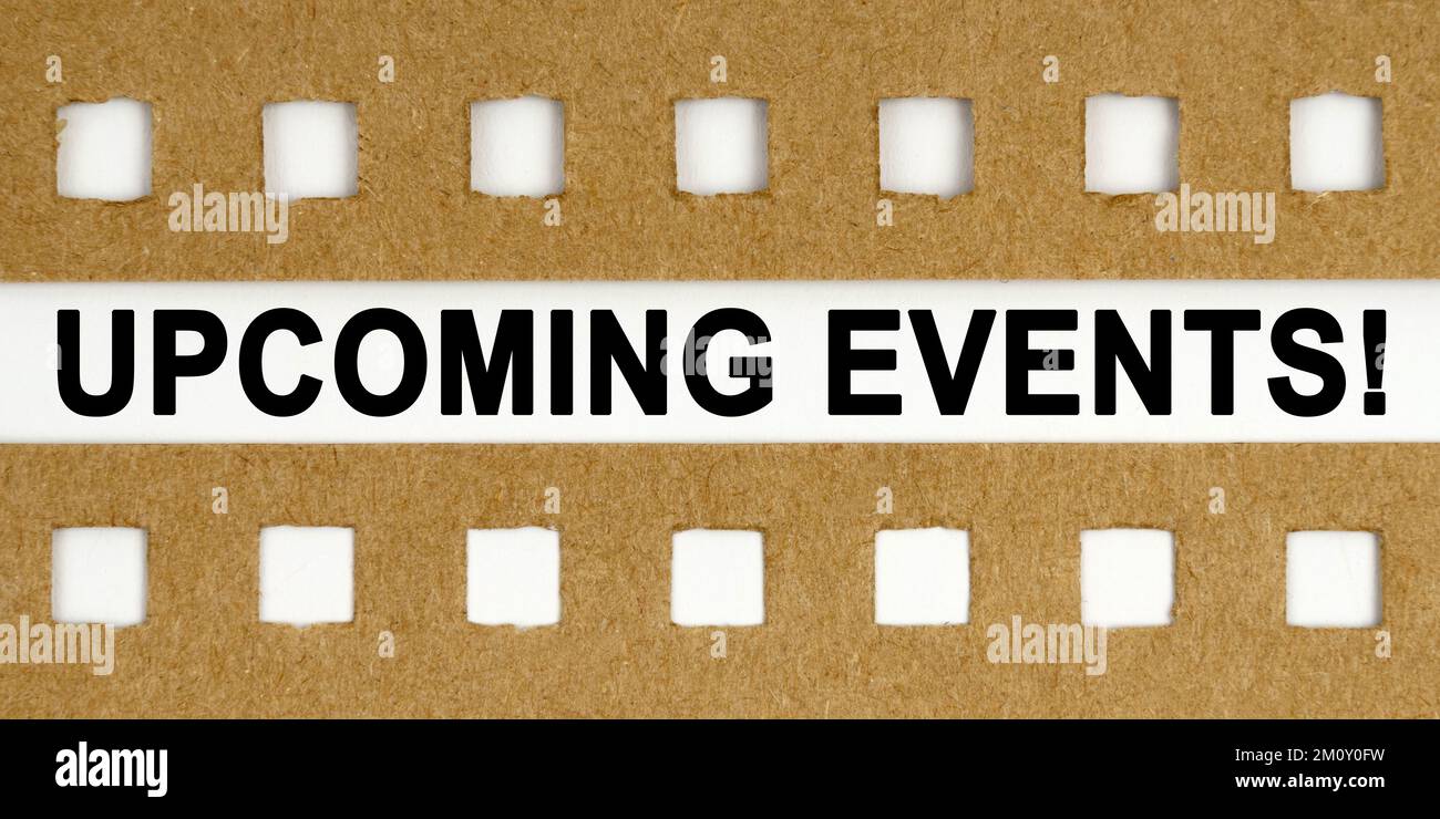 Business and economy concept. Between the sheets with holes on a white ...