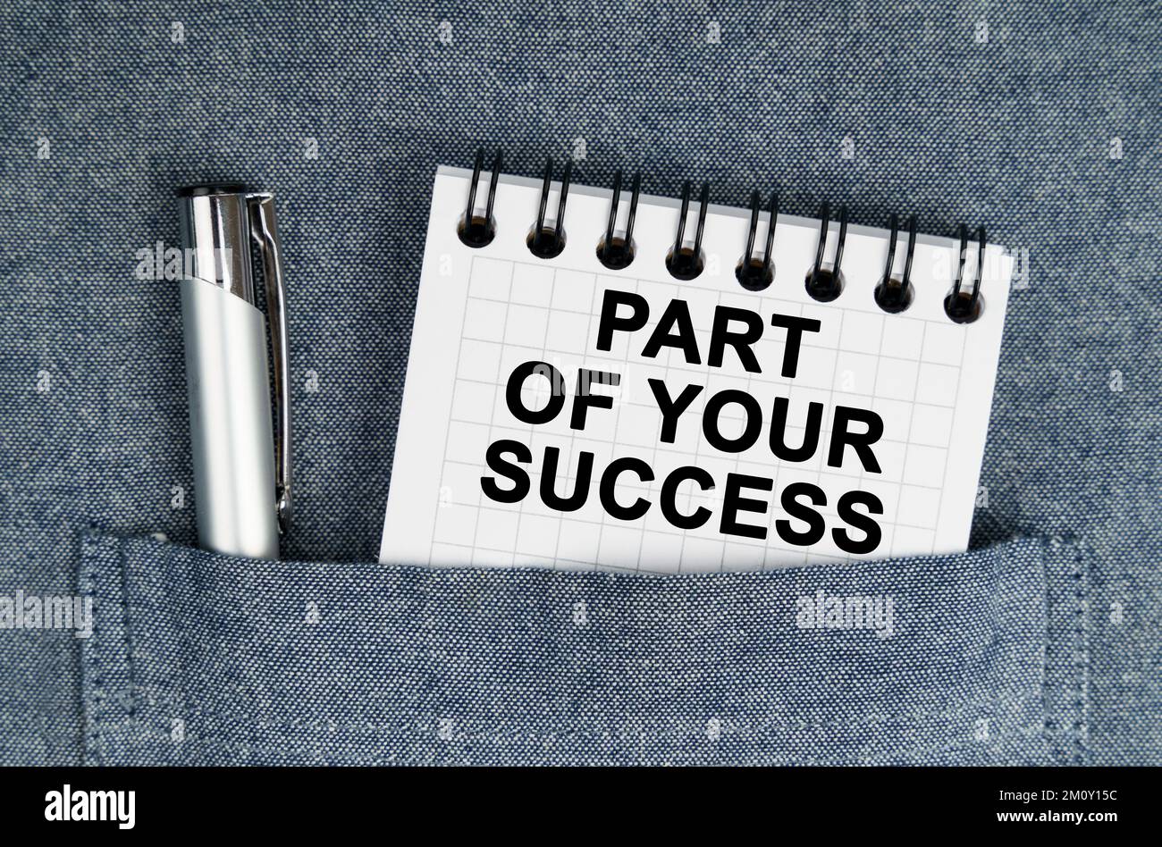 Business and finance concept. In my pocket is a pen and a notebook with ...