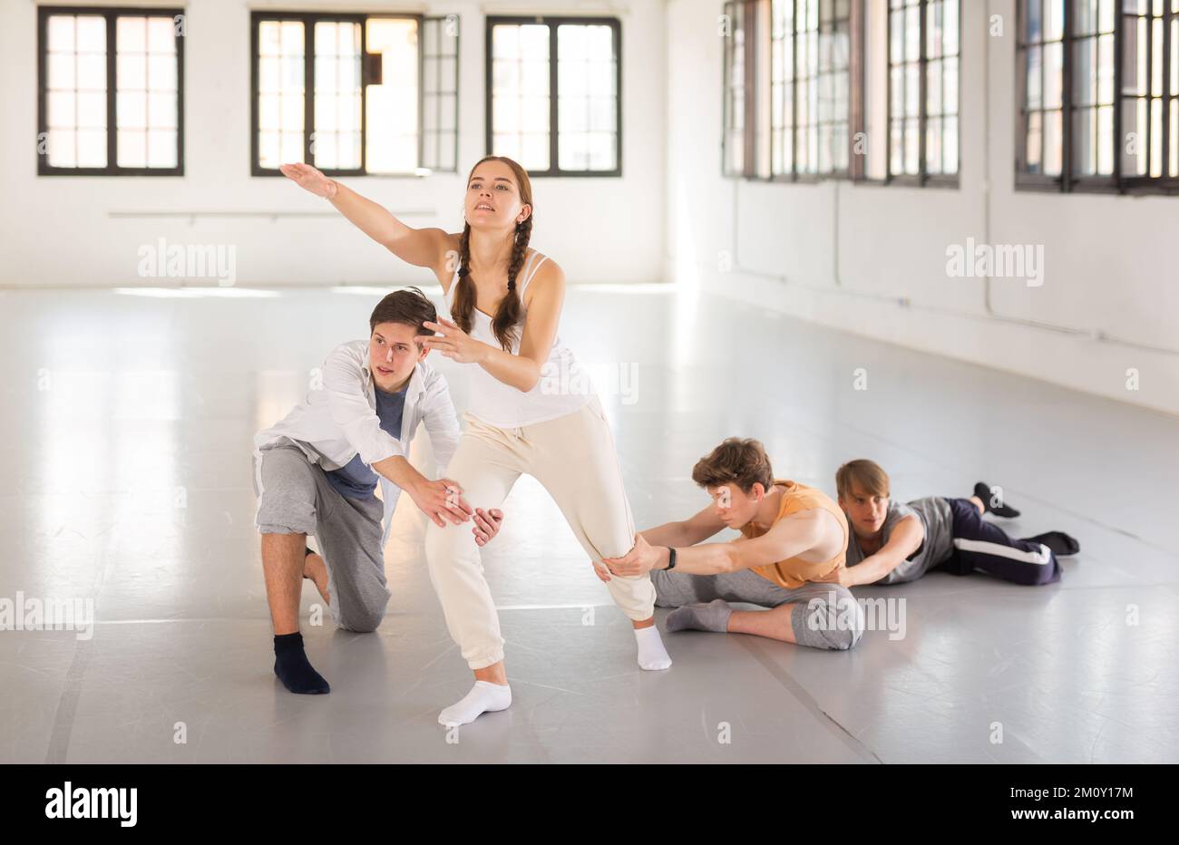 Young people rehearsing scene Stock Photo - Alamy