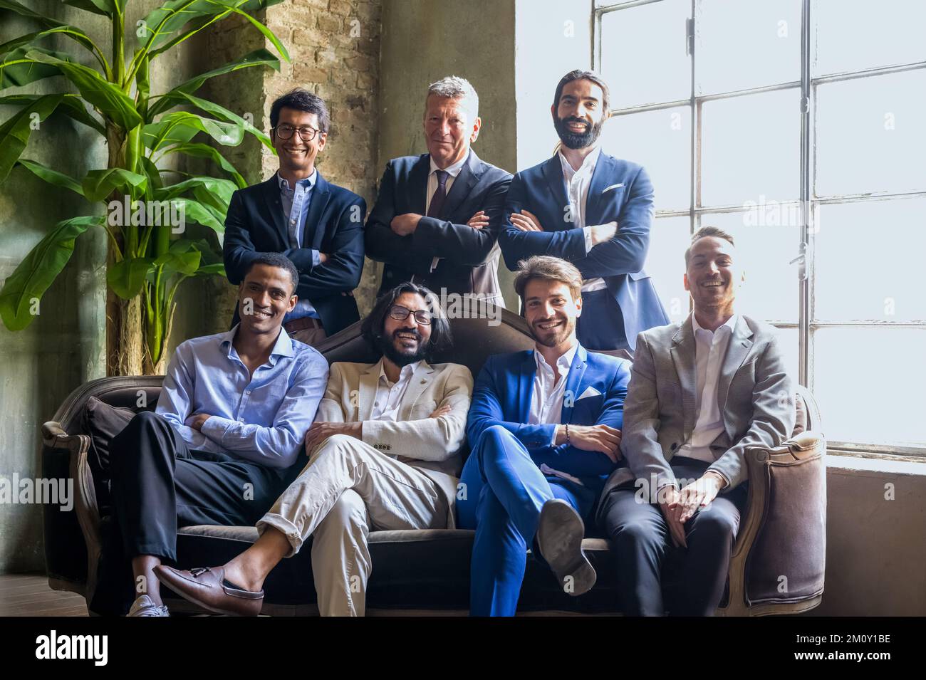 portrait of diverse businessmen, group of young and adult males working ...