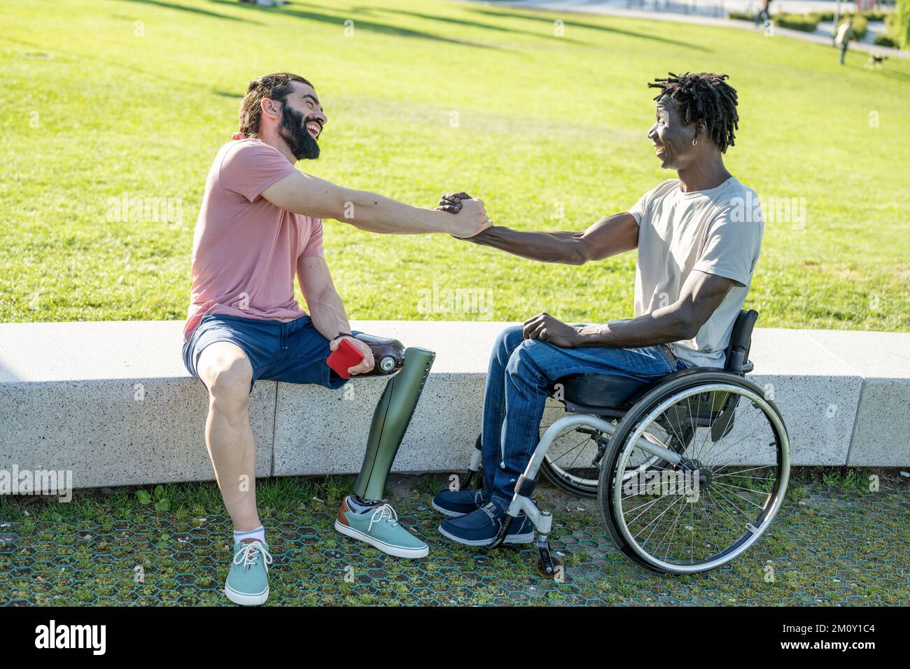 Multiracial people greeting each other, happy friends with disability ...