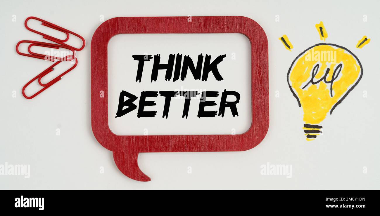 Idea and business concept. On paper, a drawing of a lamp, paper clips ...