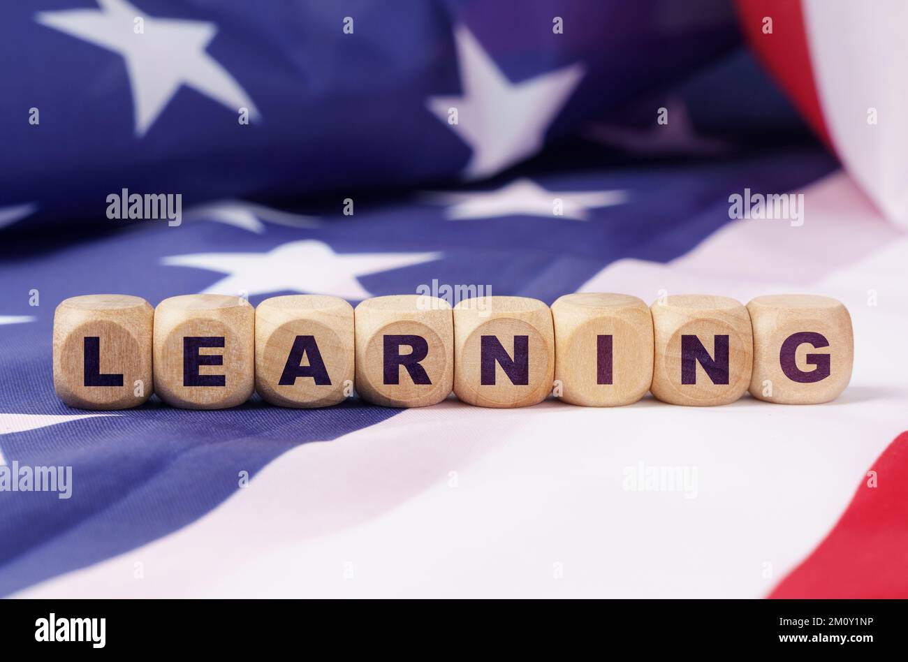 American economy and business concept. The US flag has cubes with the ...