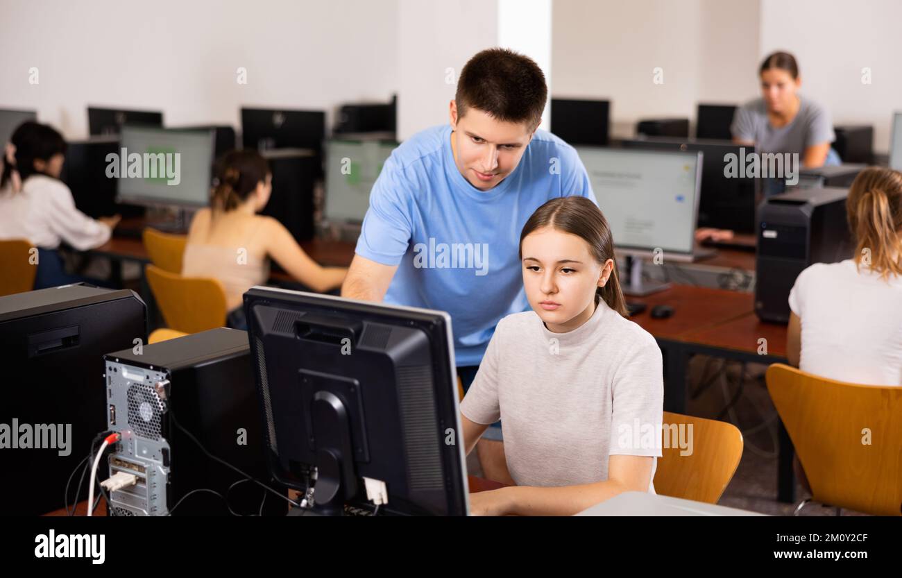 Children using computer in library hi-res stock photography and images ...