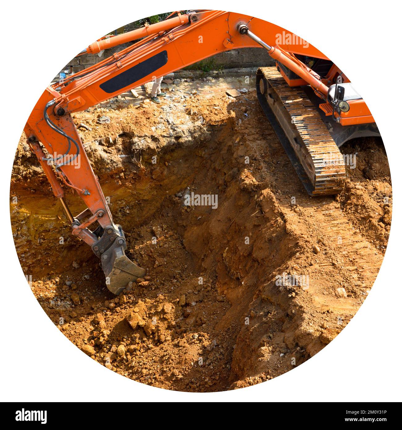 Excavator continues to work at the construction site, excavation site ...