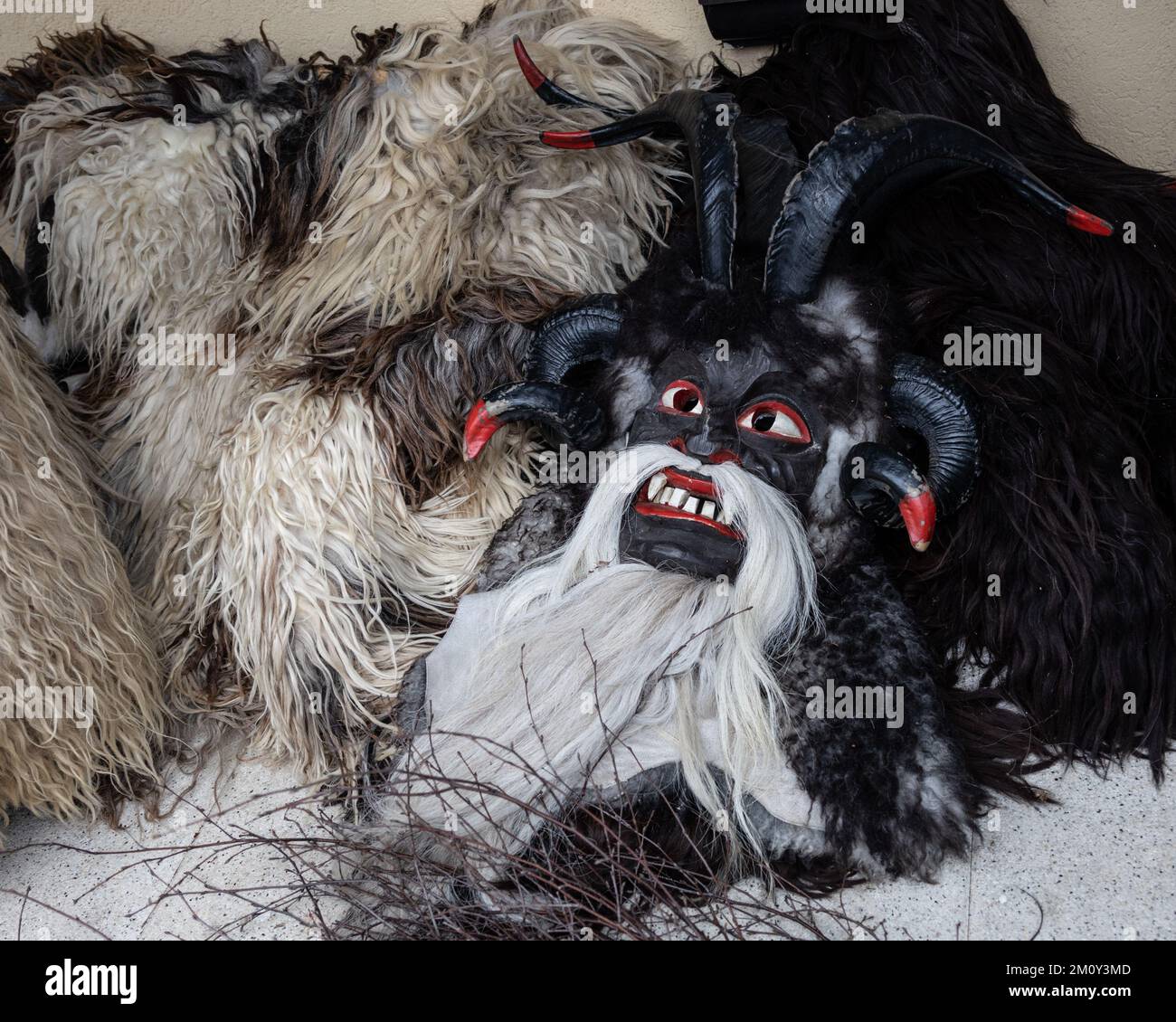 Masks and animal skins for images of Krampus, folk heroes of Christmas ...