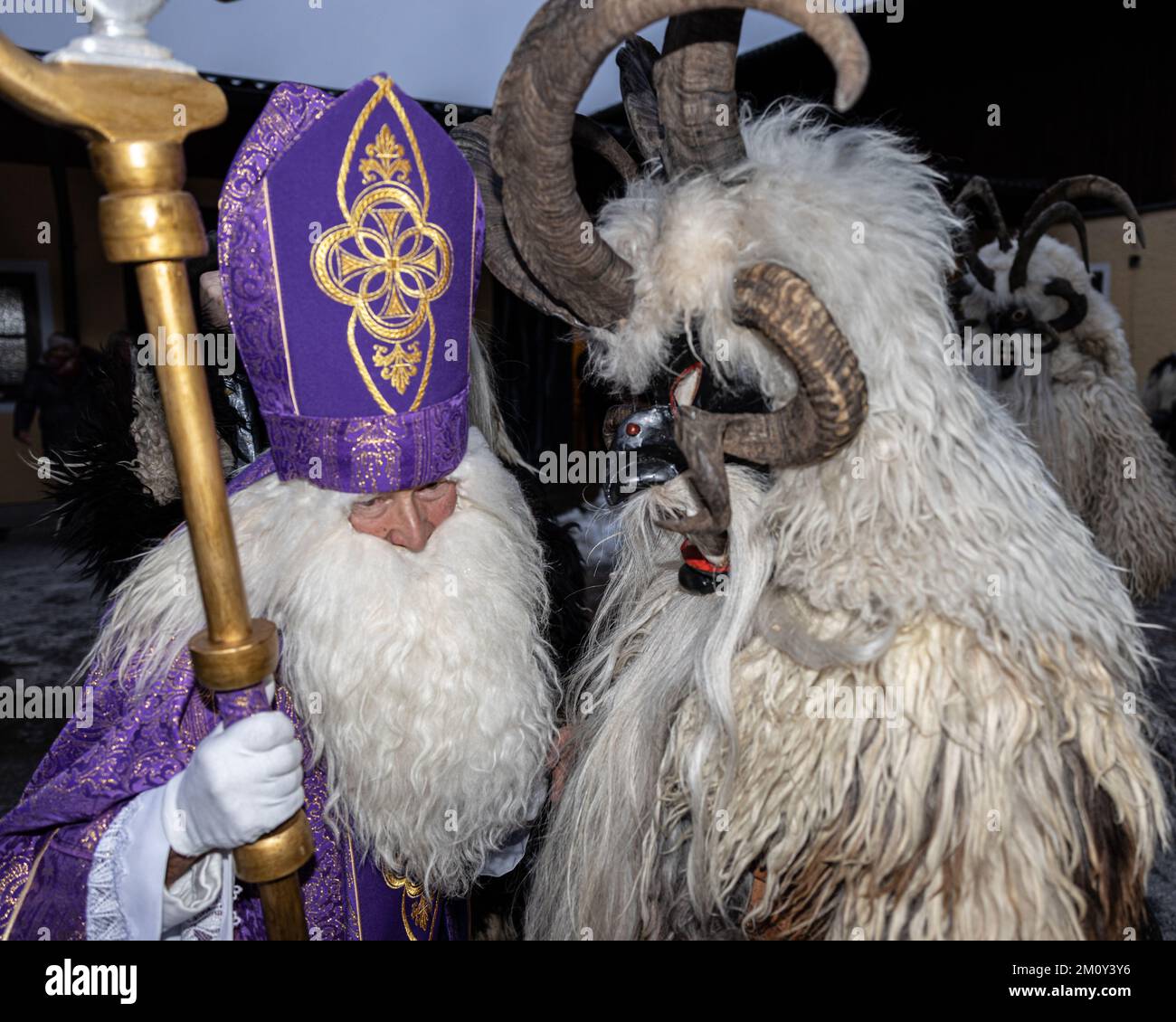 St. Nicholas and Krampus, a Christmas devil, on a traditional Christmas ...