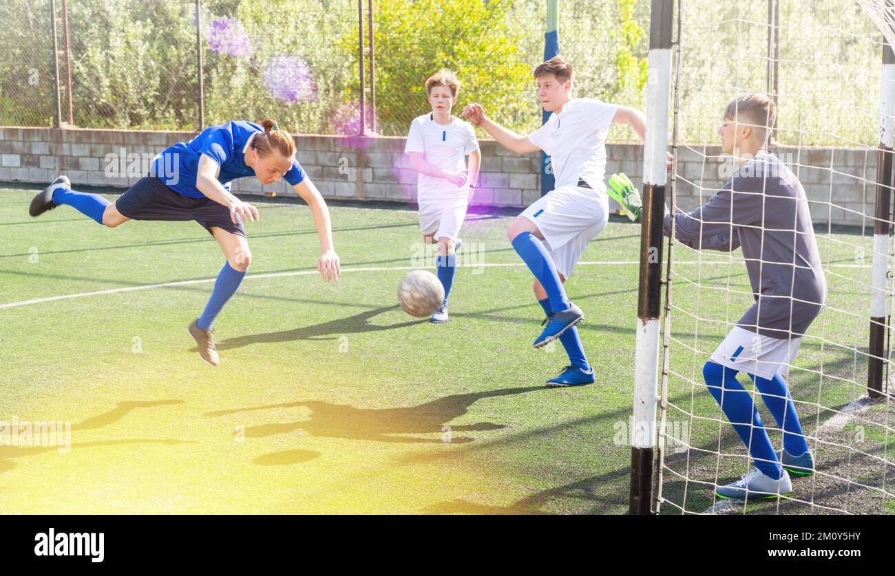 Football header boy hi-res stock photography and images - Alamy